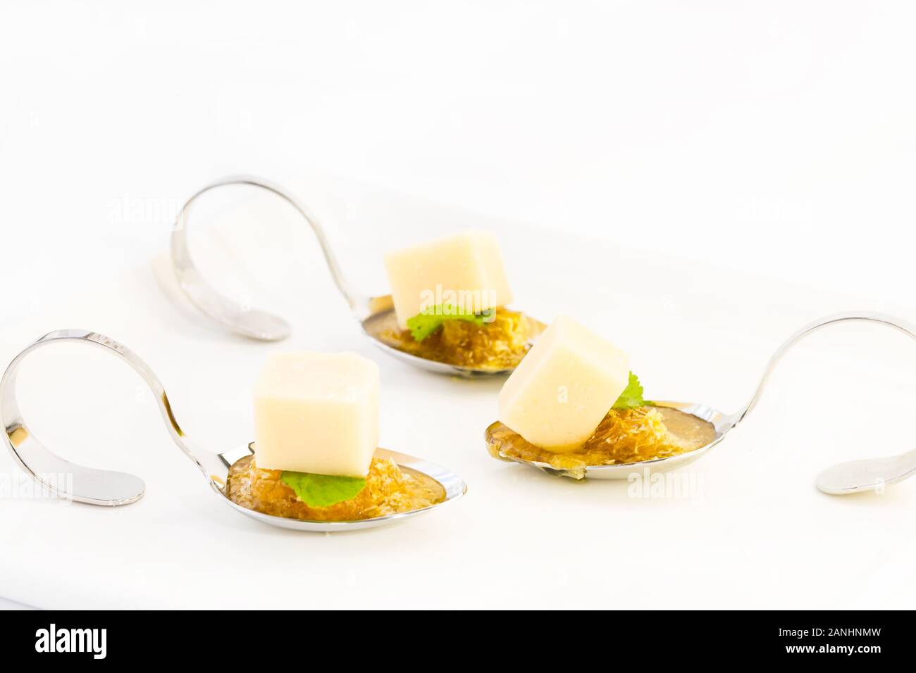 Snacks and canapes on the banquet table, closeup shot on a white ...