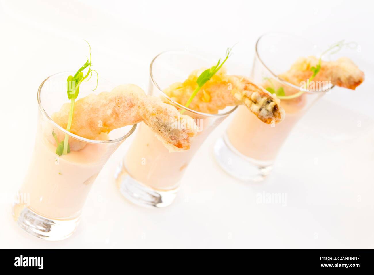Snacks and canapes on the banquet table, closeup shot on a white ...