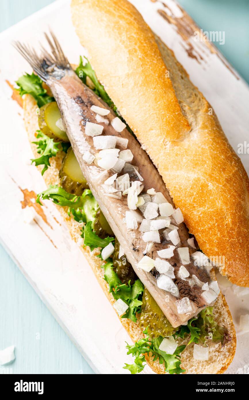 Traditional dutch snack, seafood sandwich with herring Stock Photo - Alamy