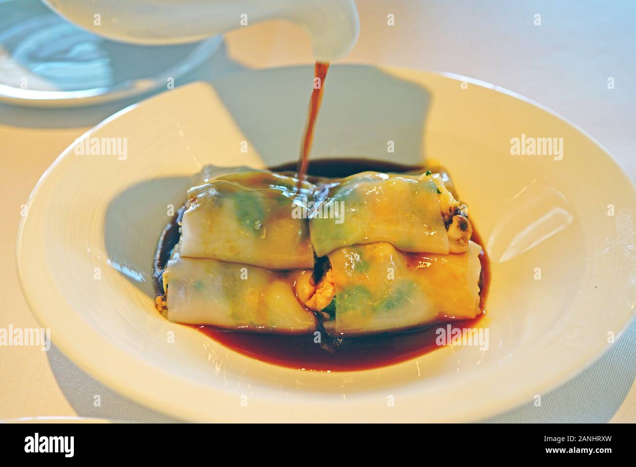 Dish of steamed Chinese rice rolls Stock Photo - Alamy