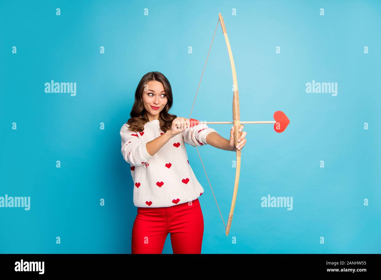 Beautiful woman aiming bow arrow hi-res stock photography and images ...