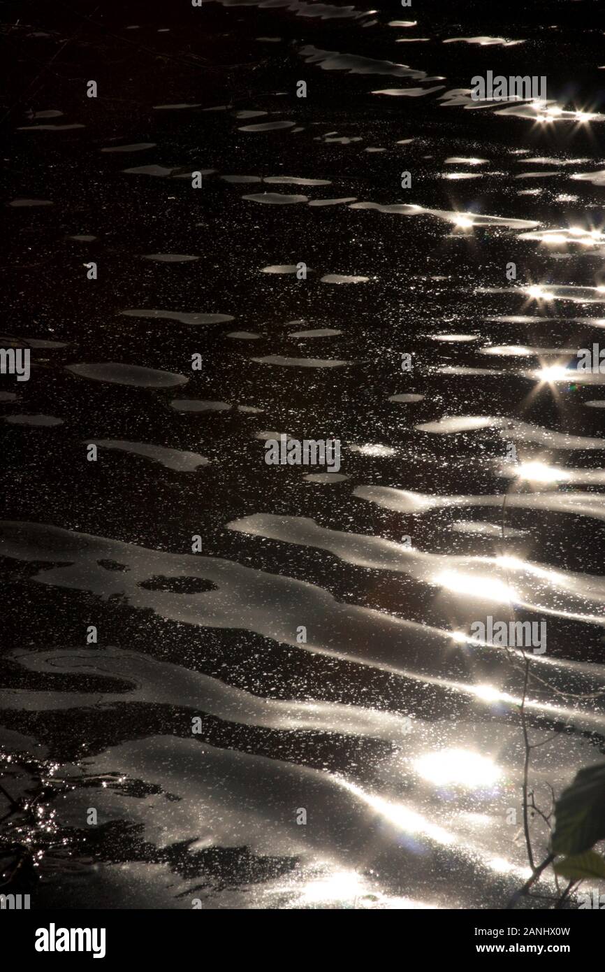 Close-up view of glittering water Stock Photo - Alamy
