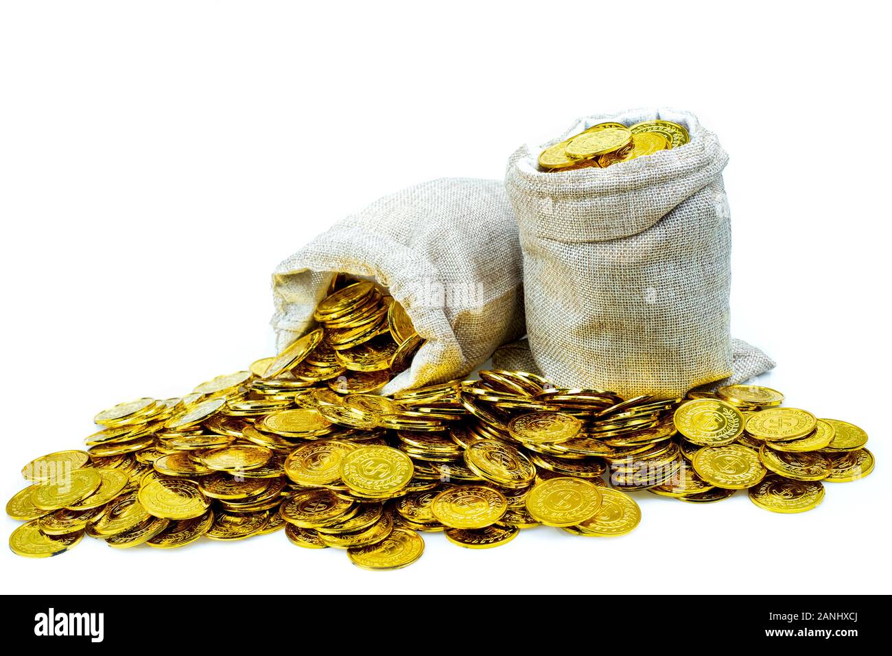 Stacking gold coin in treasure sack on white background Stock Photo - Alamy