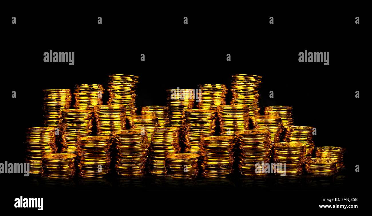 Stacking gold coin in treasure stack at black background Stock Photo ...