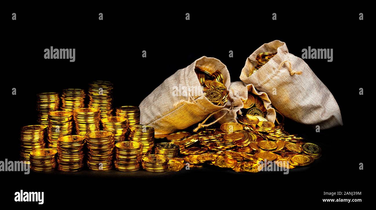 Stacking gold coin in treasure stack at black background Stock Photo ...