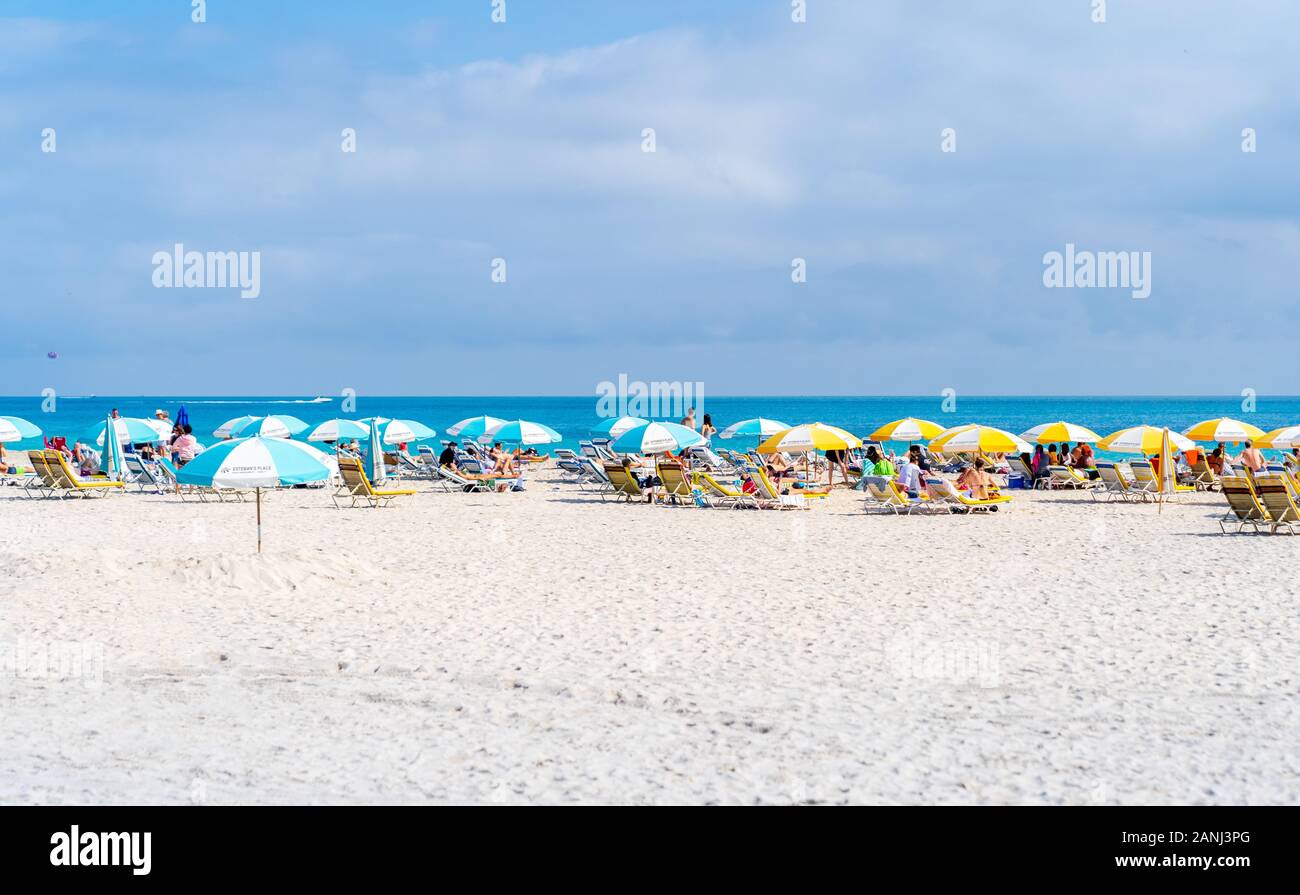South Beach, Miami, Florida - December 31, 2019: Beachgoers Enjoying ...