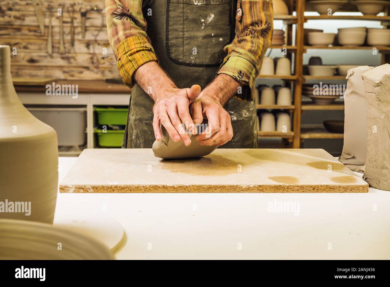 Man modeling clay hi-res stock photography and images - Alamy