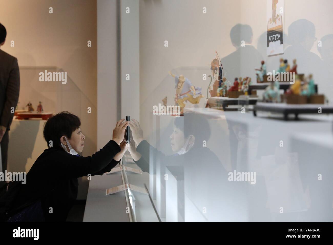 Tokyo, Jan. 17. 8th Feb, 2020. A visitor takes photos of dough ...