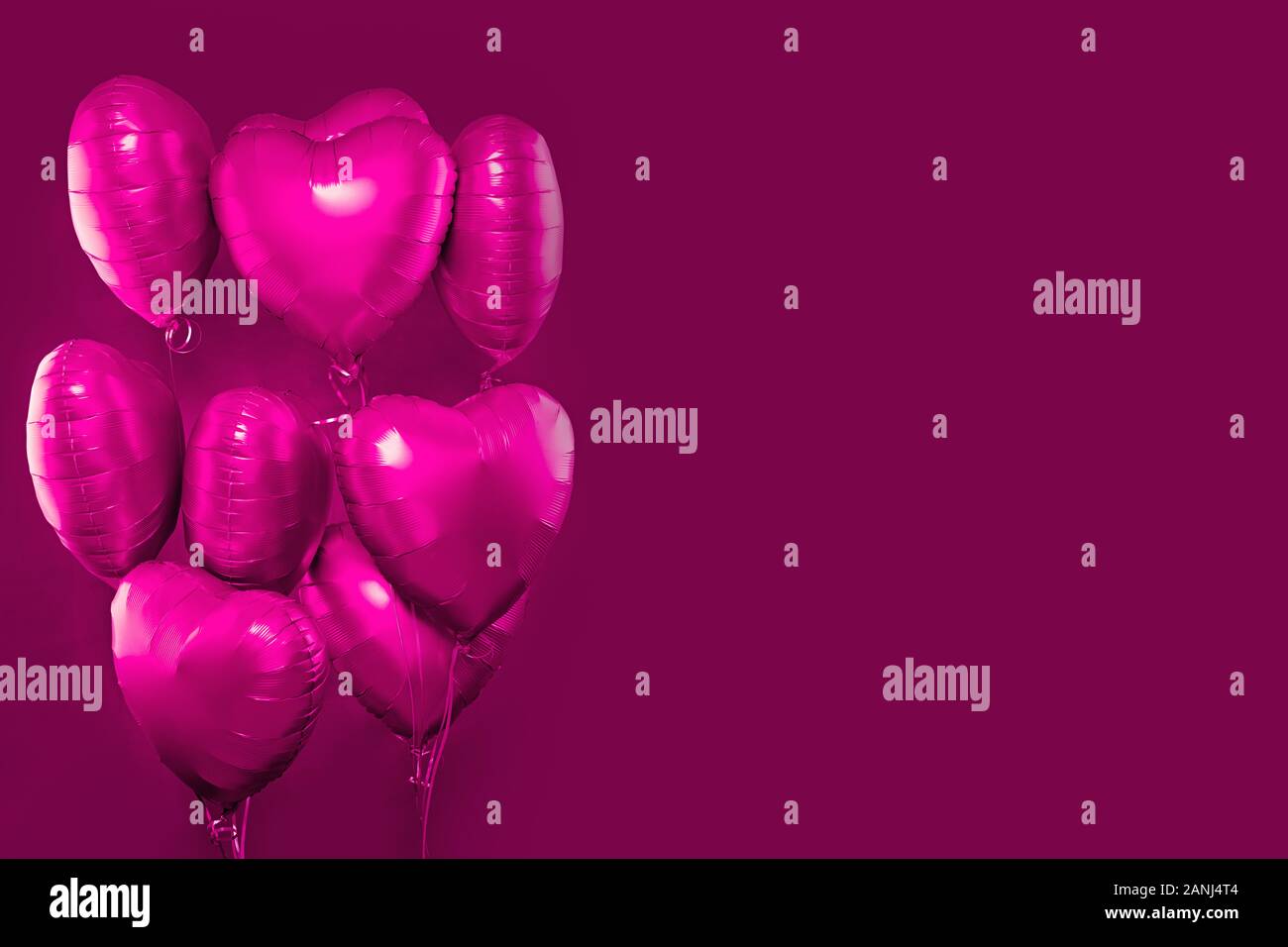Pink heart balloons on bright pink card background Stock Photo - Alamy