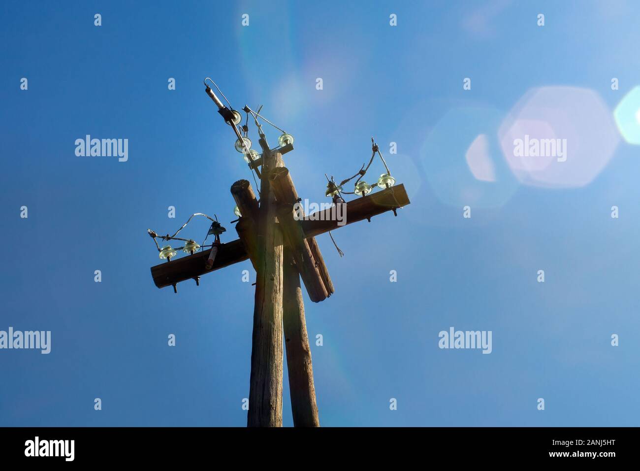 Distribution of electricity. Power pillar against blue sky. Electrical ...