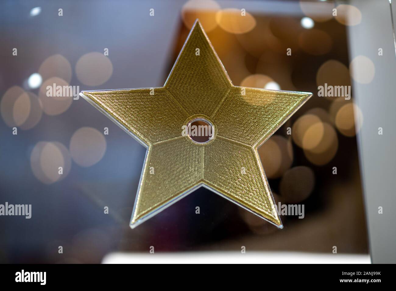 gold star in the shop window Stock Photo - Alamy