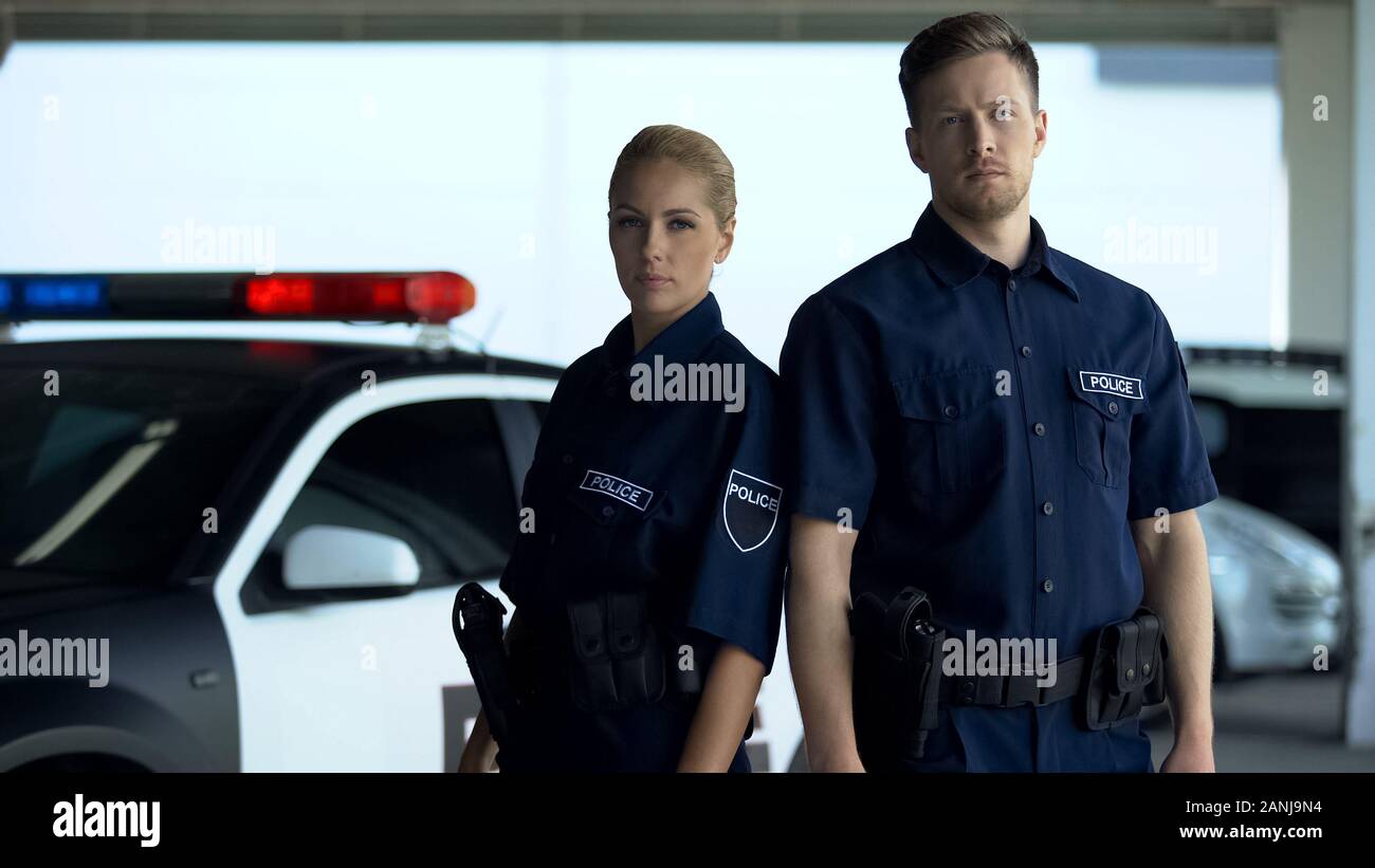 Police Standing Car On Road High Resolution Stock Photography and ...