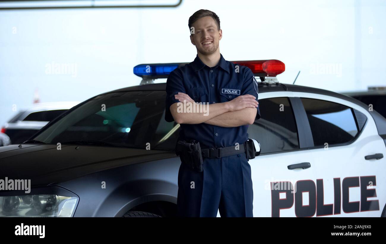 Standing police officer carrying on duty uniform hi-res stock ...