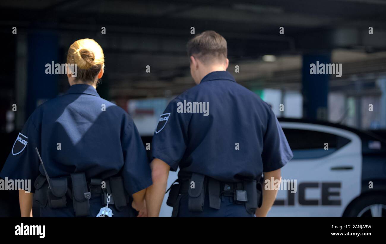 Walking police officer on duty security hi-res stock photography and ...