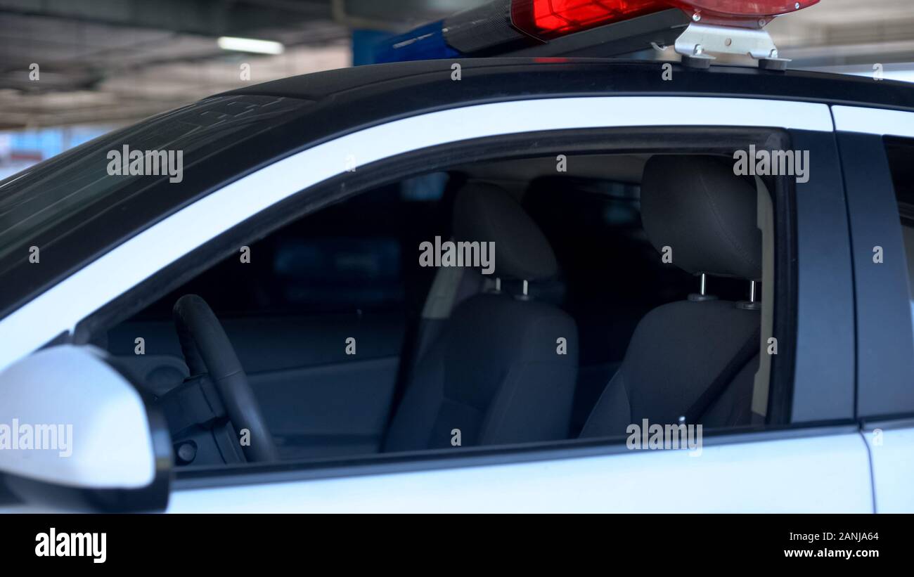 Empty police car on parking lot, district patrol, maintenance of order ...