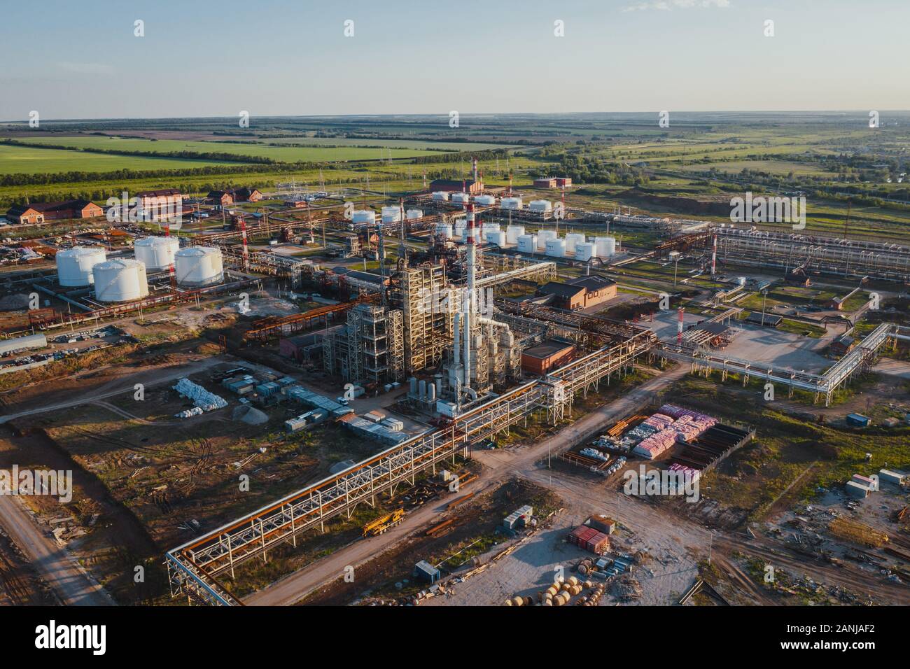 Oil refinery construction Stock Photo - Alamy