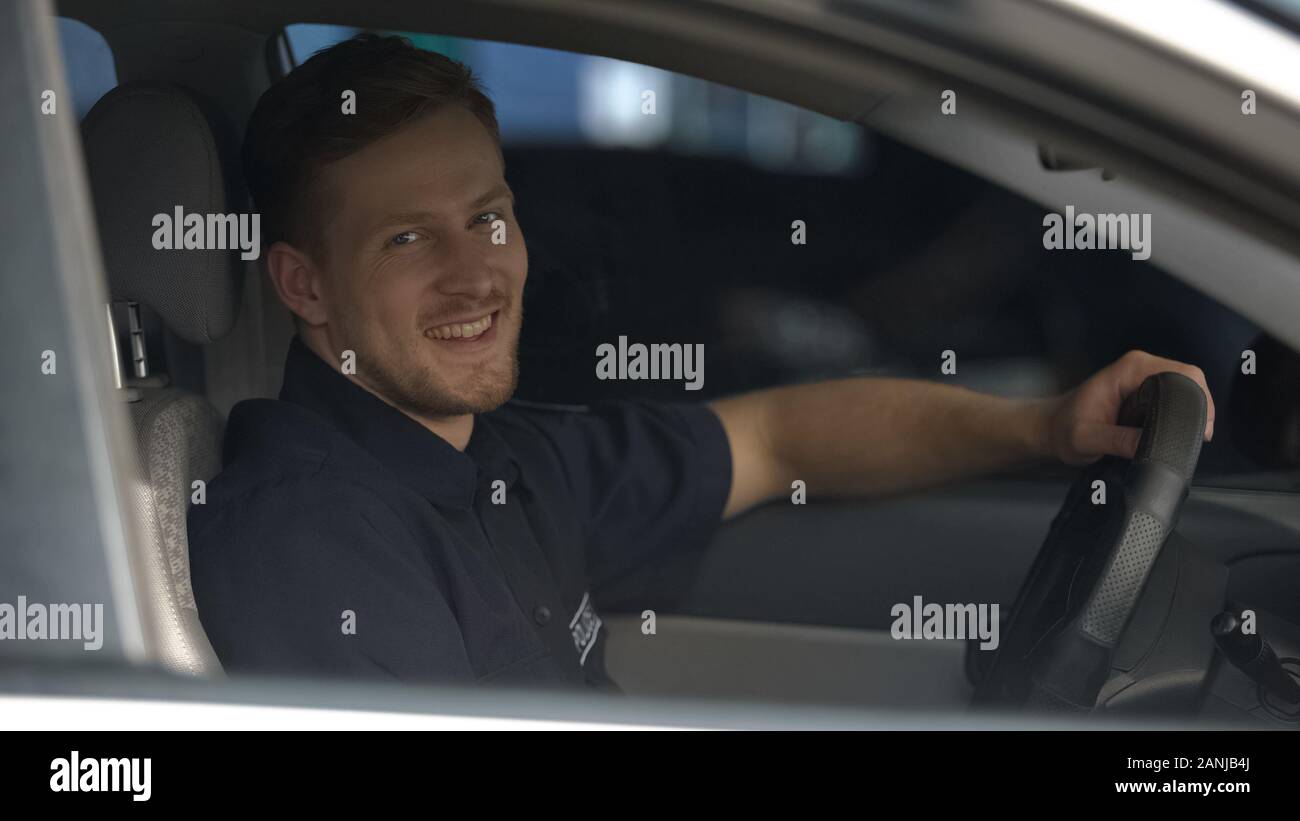 Friendly police officer working hi-res stock photography and images - Alamy