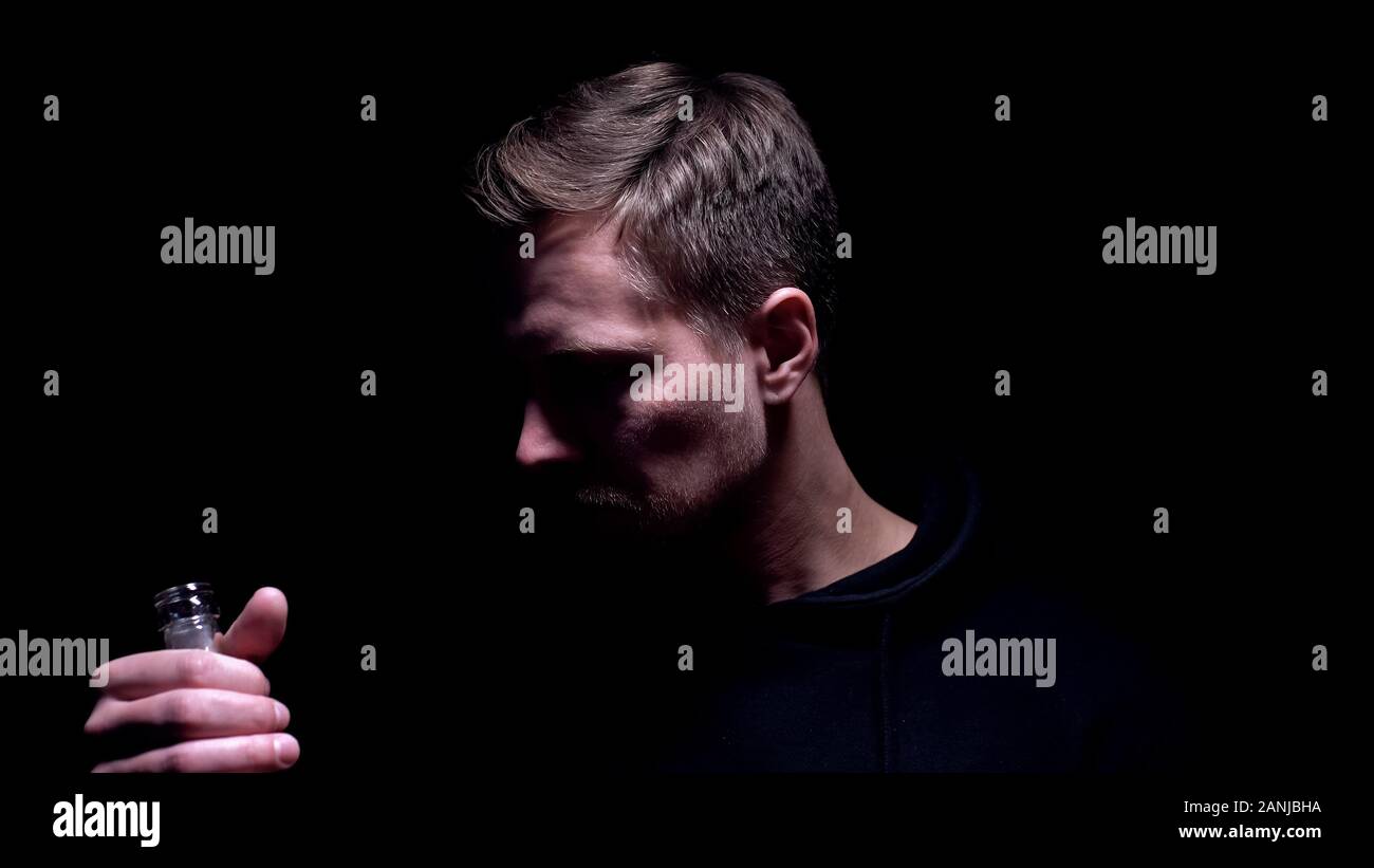 Addicted man holding vodka bottle, alcohol abuse problem, unhealthy ...