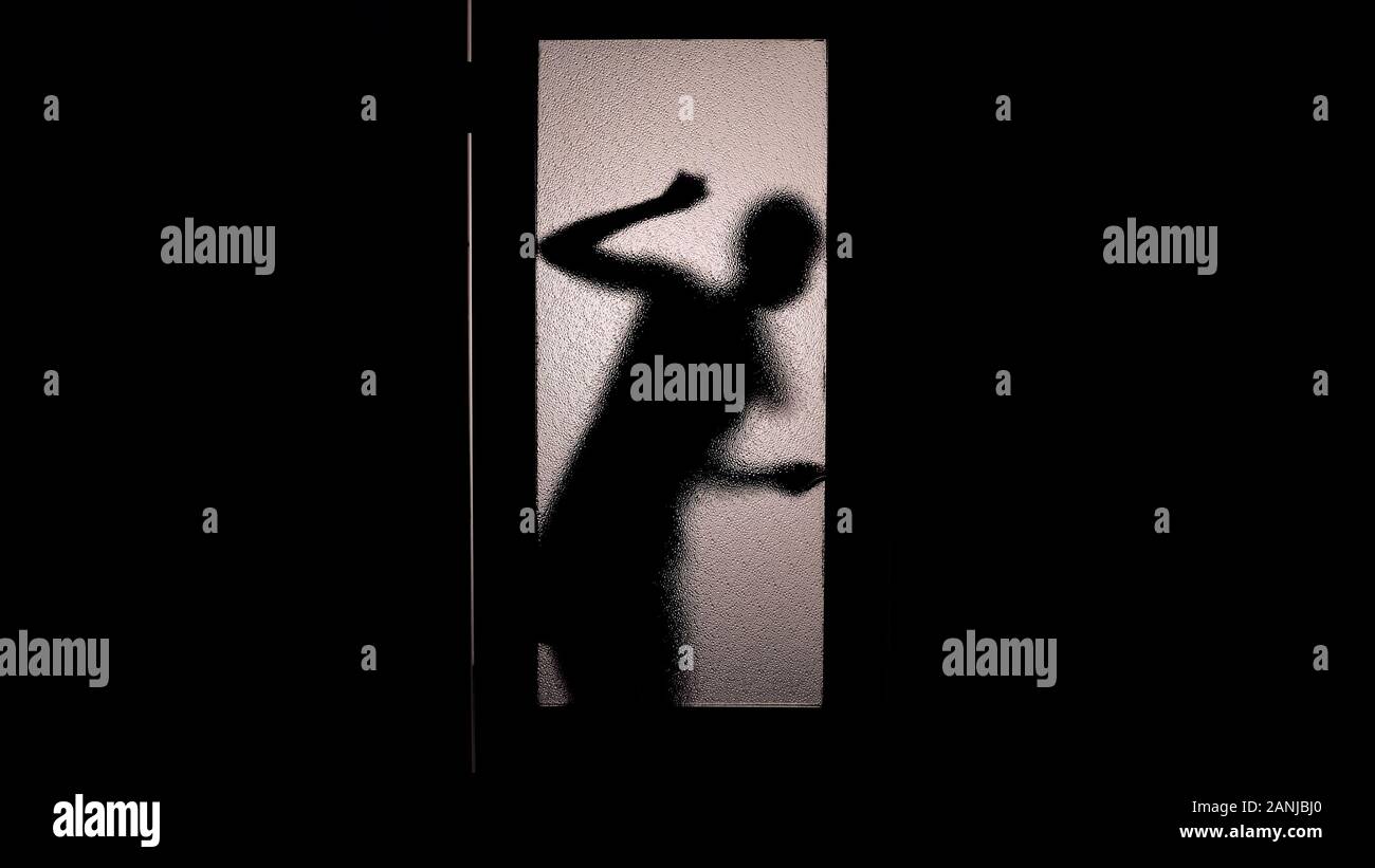Woman knocking door hi-res stock photography and images - Alamy