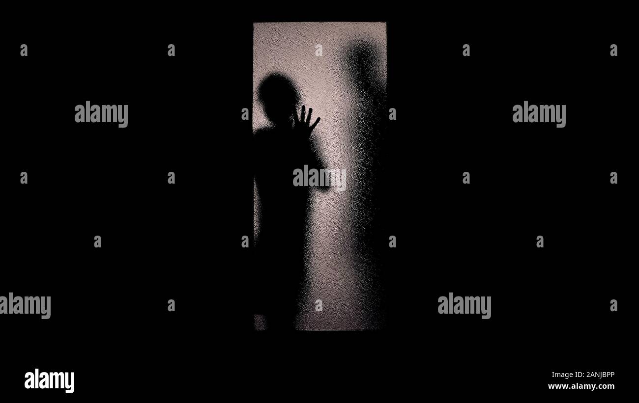 Silhouette people arguing behind glass hi-res stock photography and ...