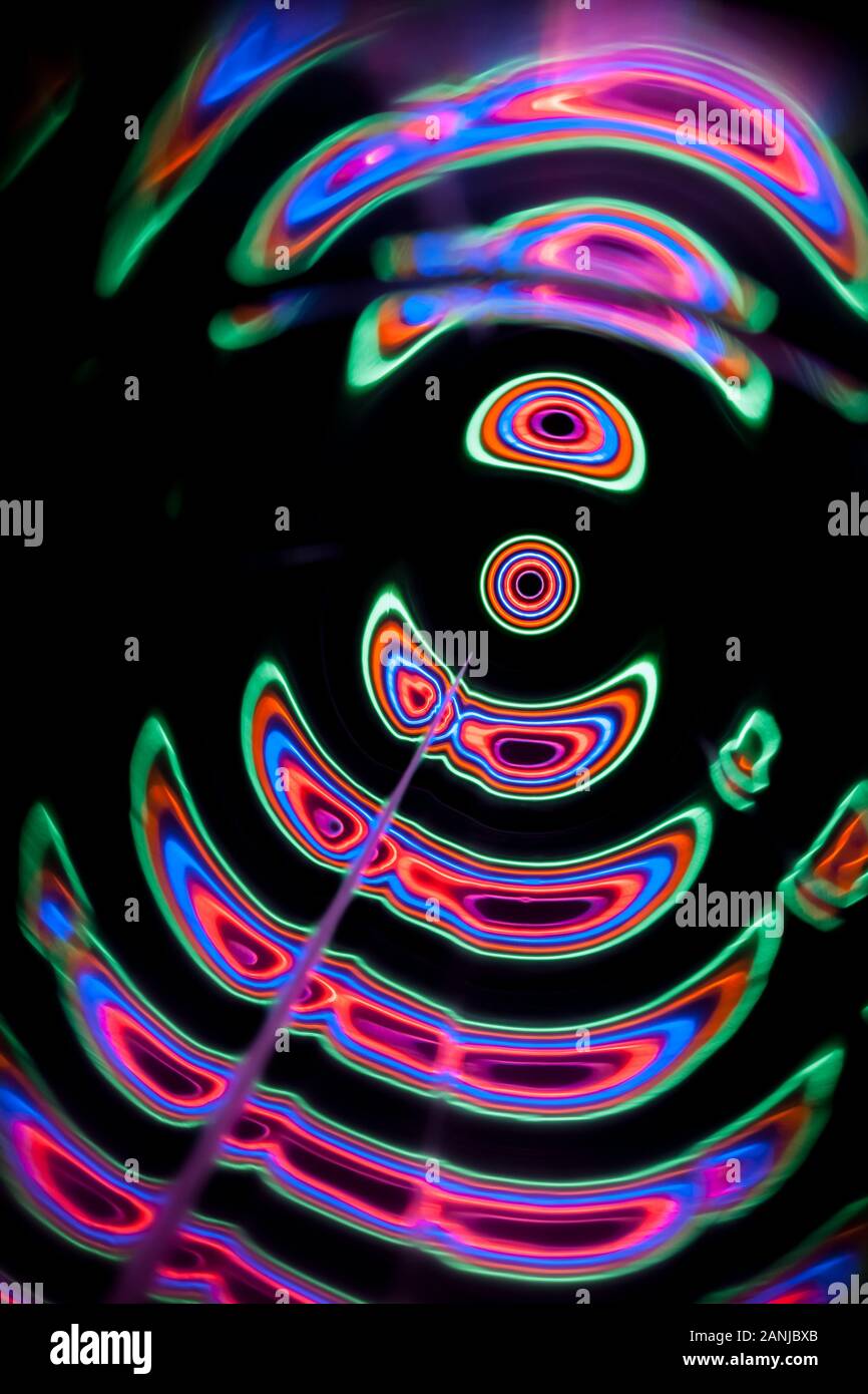 Sound waves in the visible full color in the dark Stock Photo - Alamy