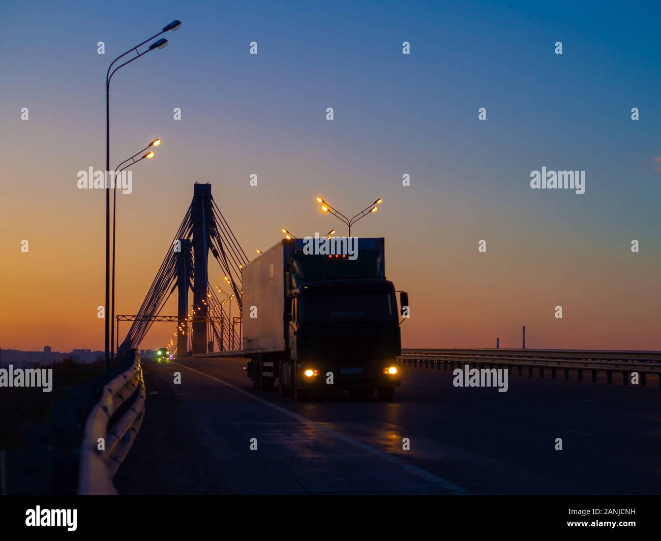 Truck on highway Stock Photo - Alamy