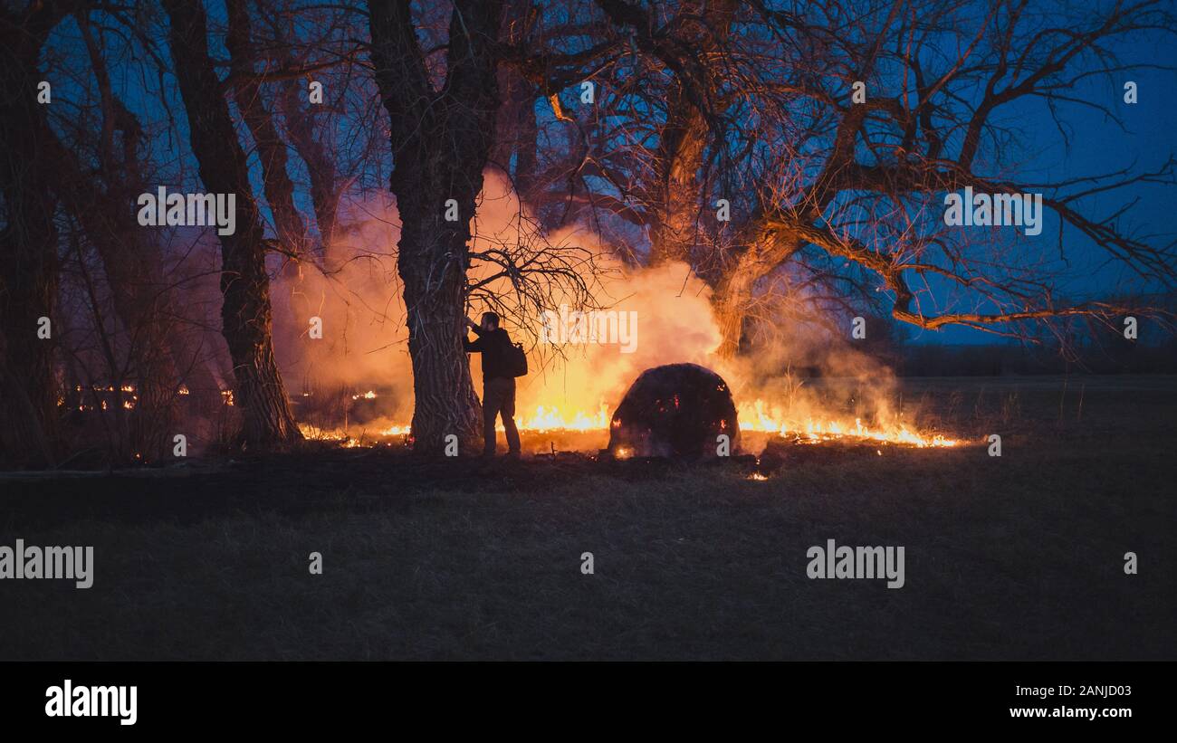 Field fire night Stock Photo - Alamy