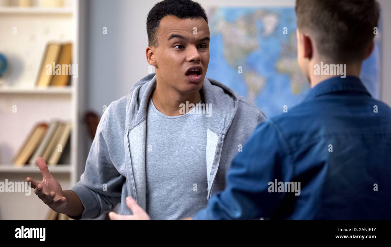 Angry teenagers arguing african hi-res stock photography and images - Alamy