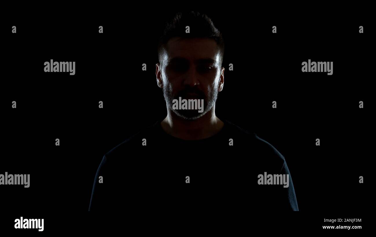 Depressed male in shadow, trouble hopelessness, men's health problem ...