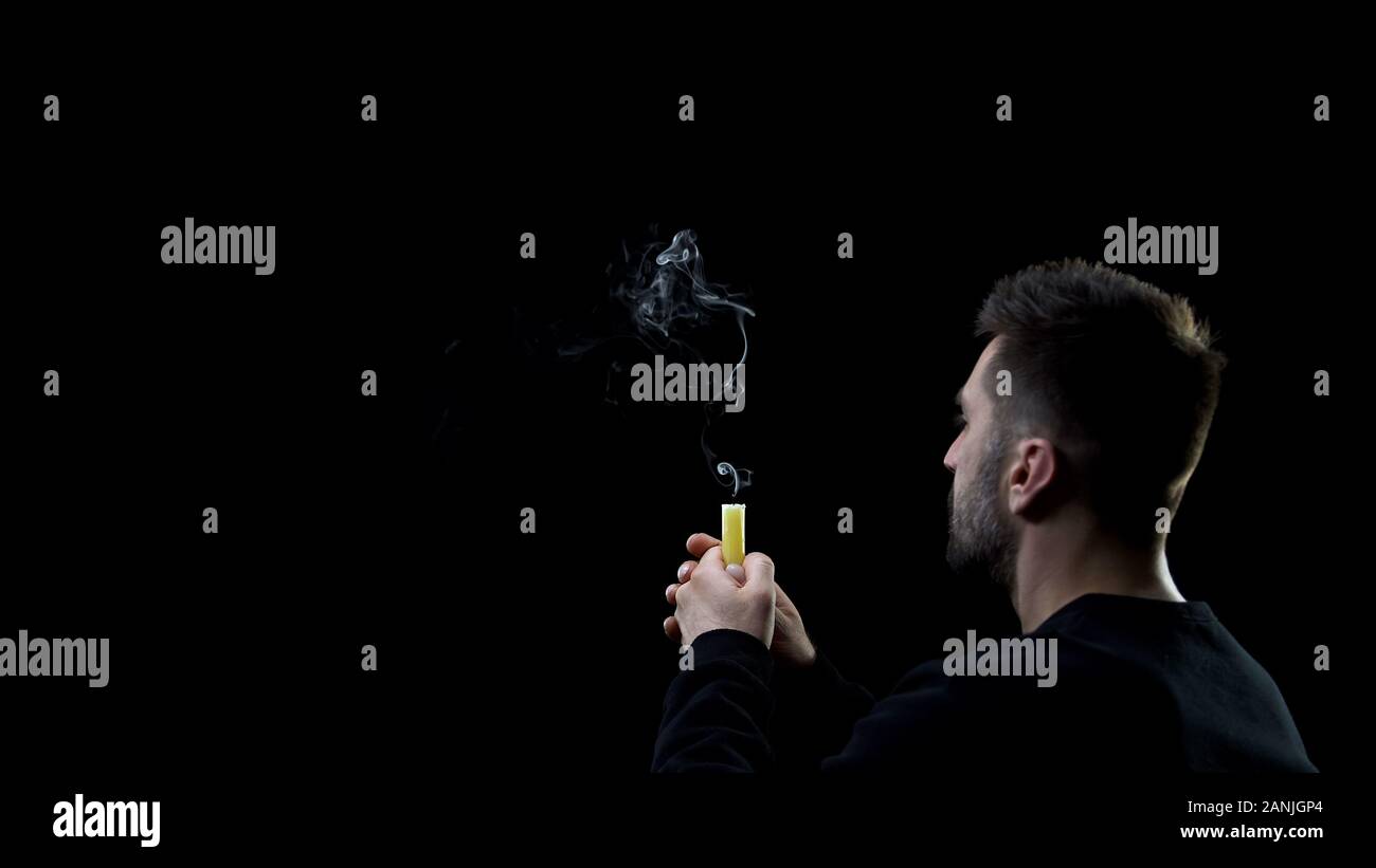 Blown out candle male hands, loss of hope, mysterious ritual, religious ...