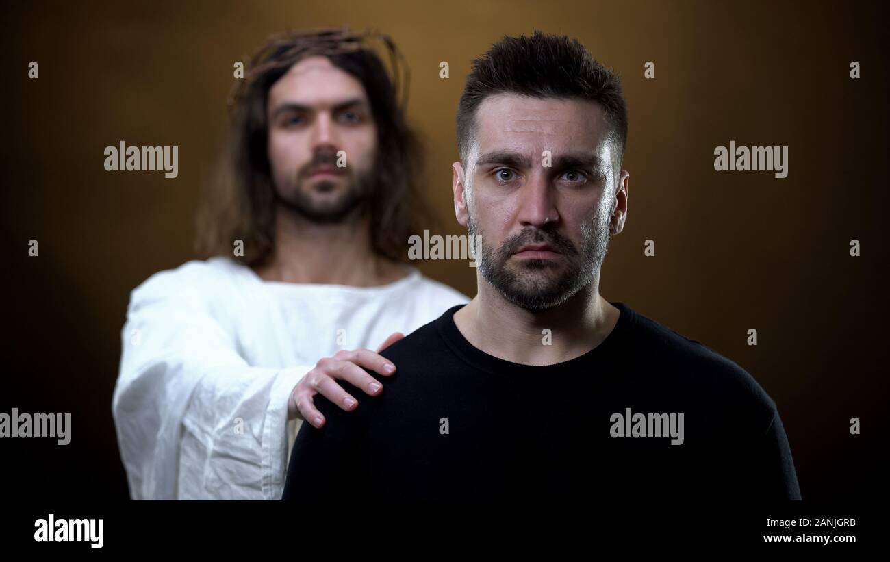 Jesus Christ supporting desperate man, preventing crime, religious ...