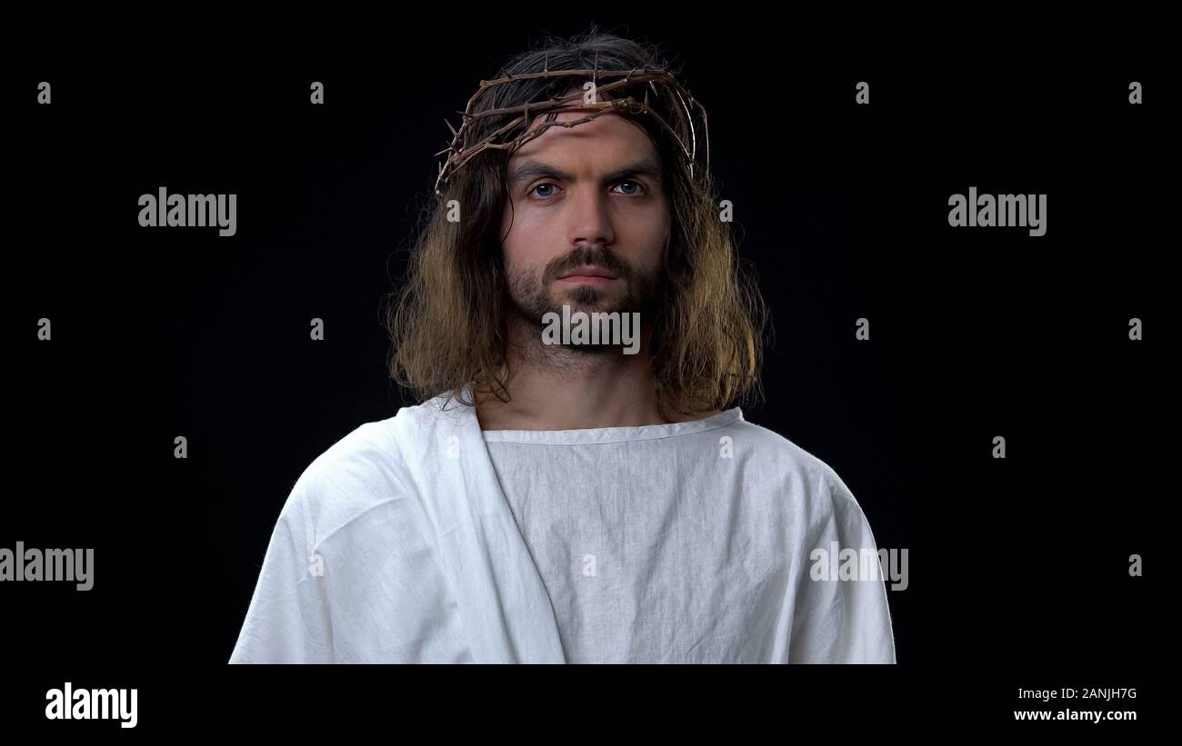 Messiah in thorns crown on dark background, biblical history, religious ...