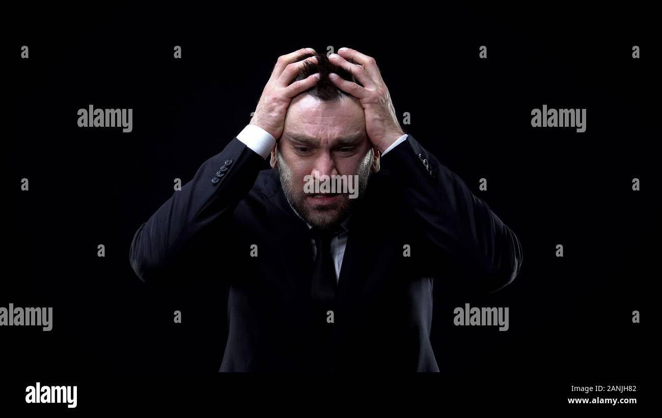 Anxious male employee suffering stress, mental disorder, business ...