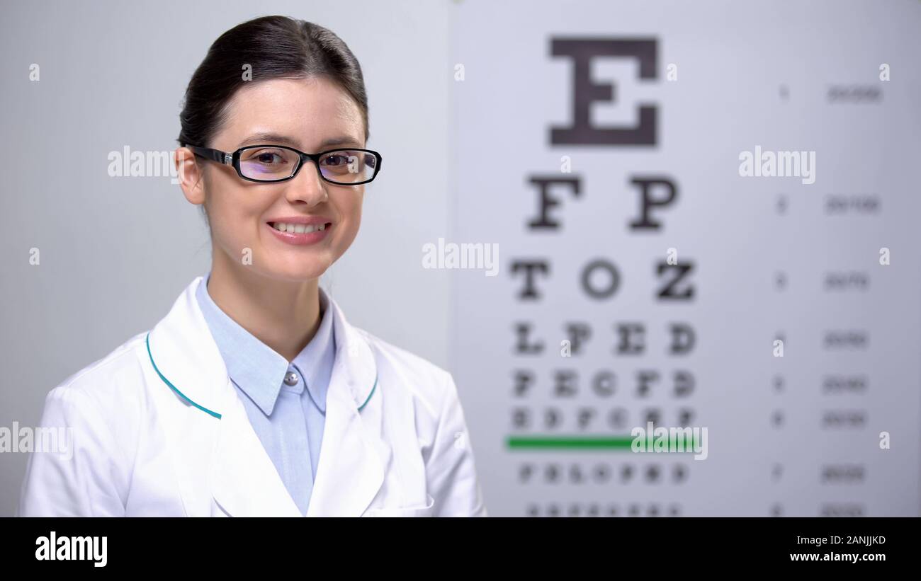 Professional smiling optometrist in hi-res stock photography and images ...