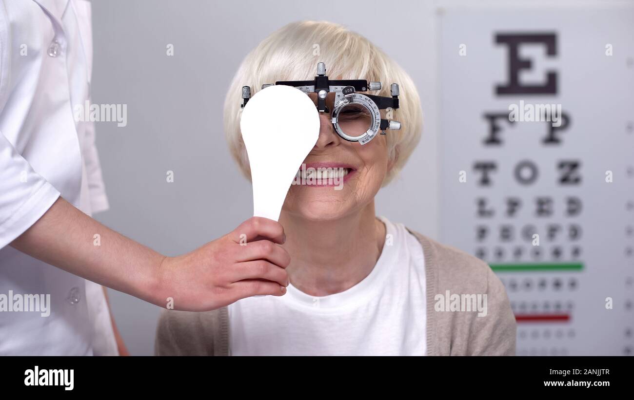 Eyes closing woman doctor hi-res stock photography and images - Alamy