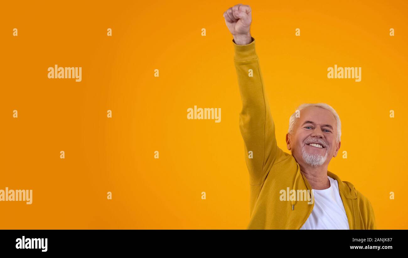 Cheerful elderly male stretching hand hi-res stock photography and ...