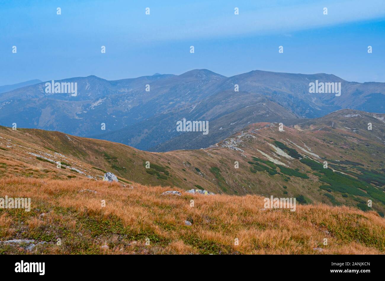 Tourist hiking route along the high ridge between the peaks of the ...