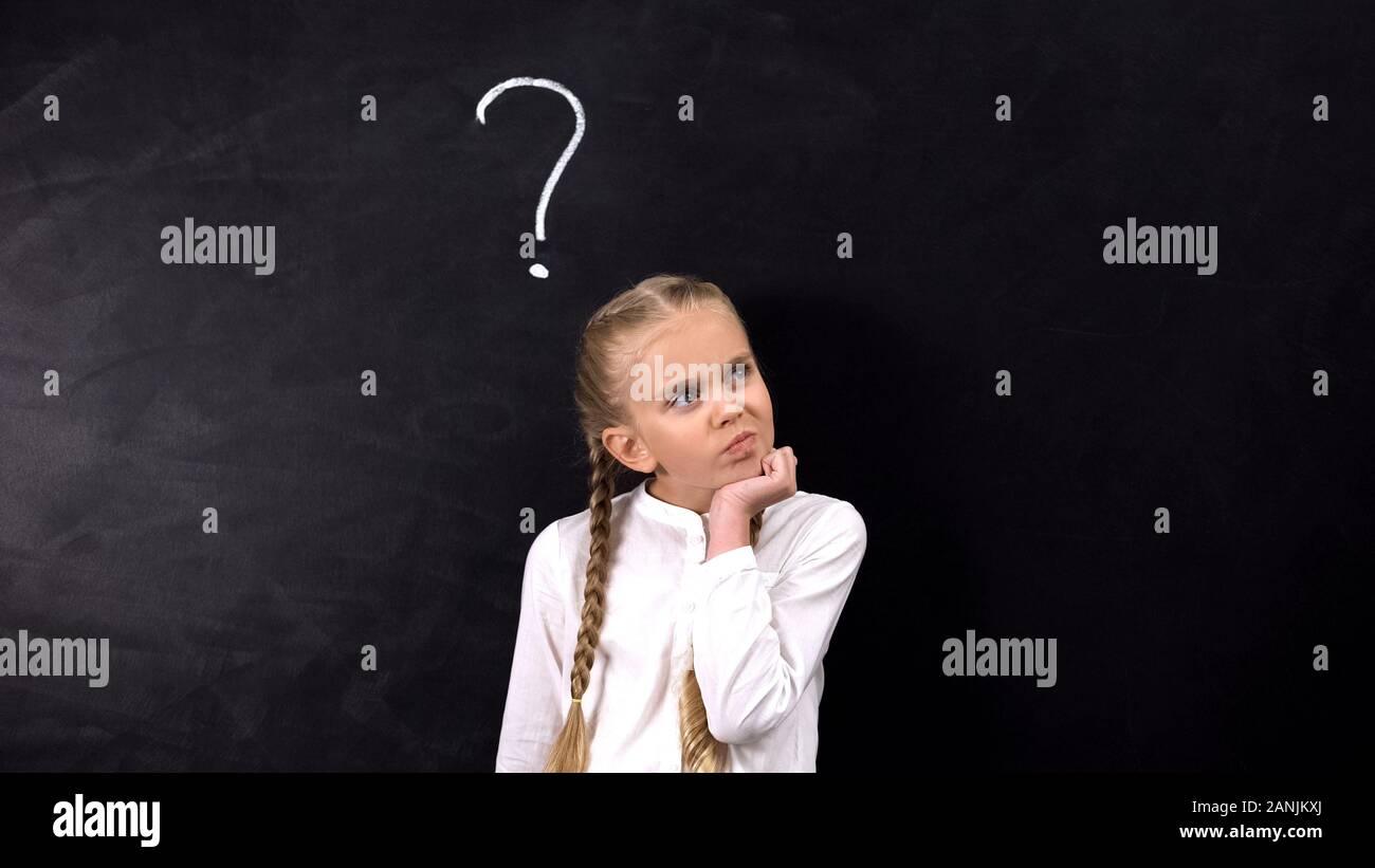 Pupil thinking about answer, lack of knowledge, question mark on ...