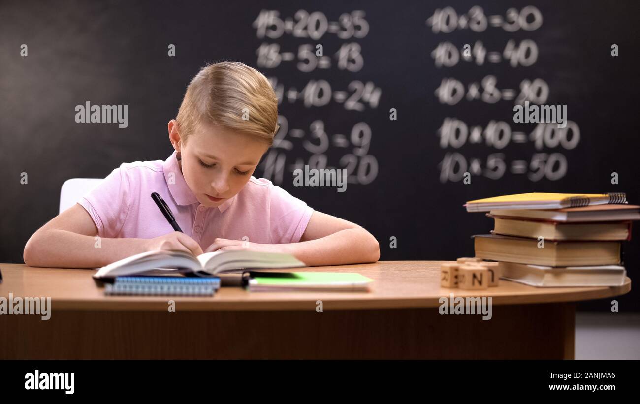 Smart cute boy thinking math hi-res stock photography and images - Alamy