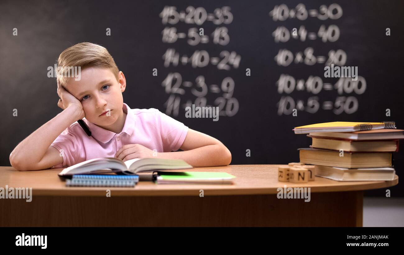 Smart cute boy thinking math hi-res stock photography and images - Alamy