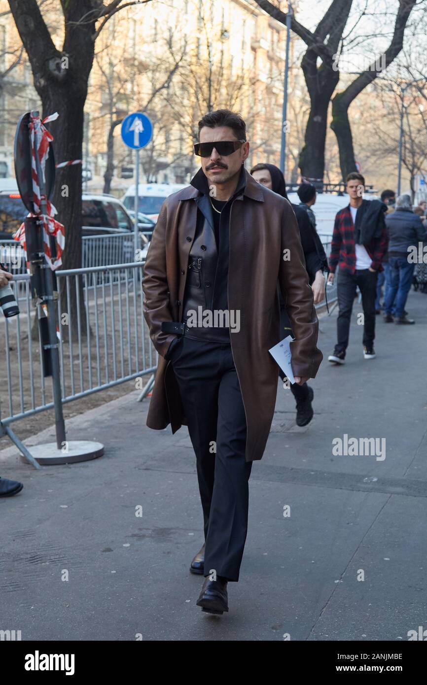 MILAN, ITALY - JANUARY 13, 2019: Alex Badia with brown leather coat ...