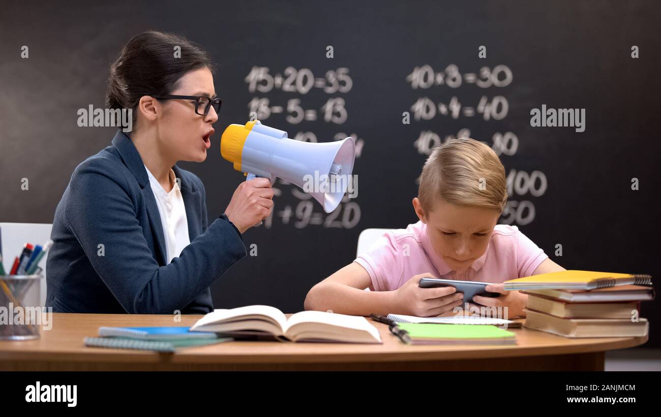 Boy shouting teacher hi-res stock photography and images - Alamy