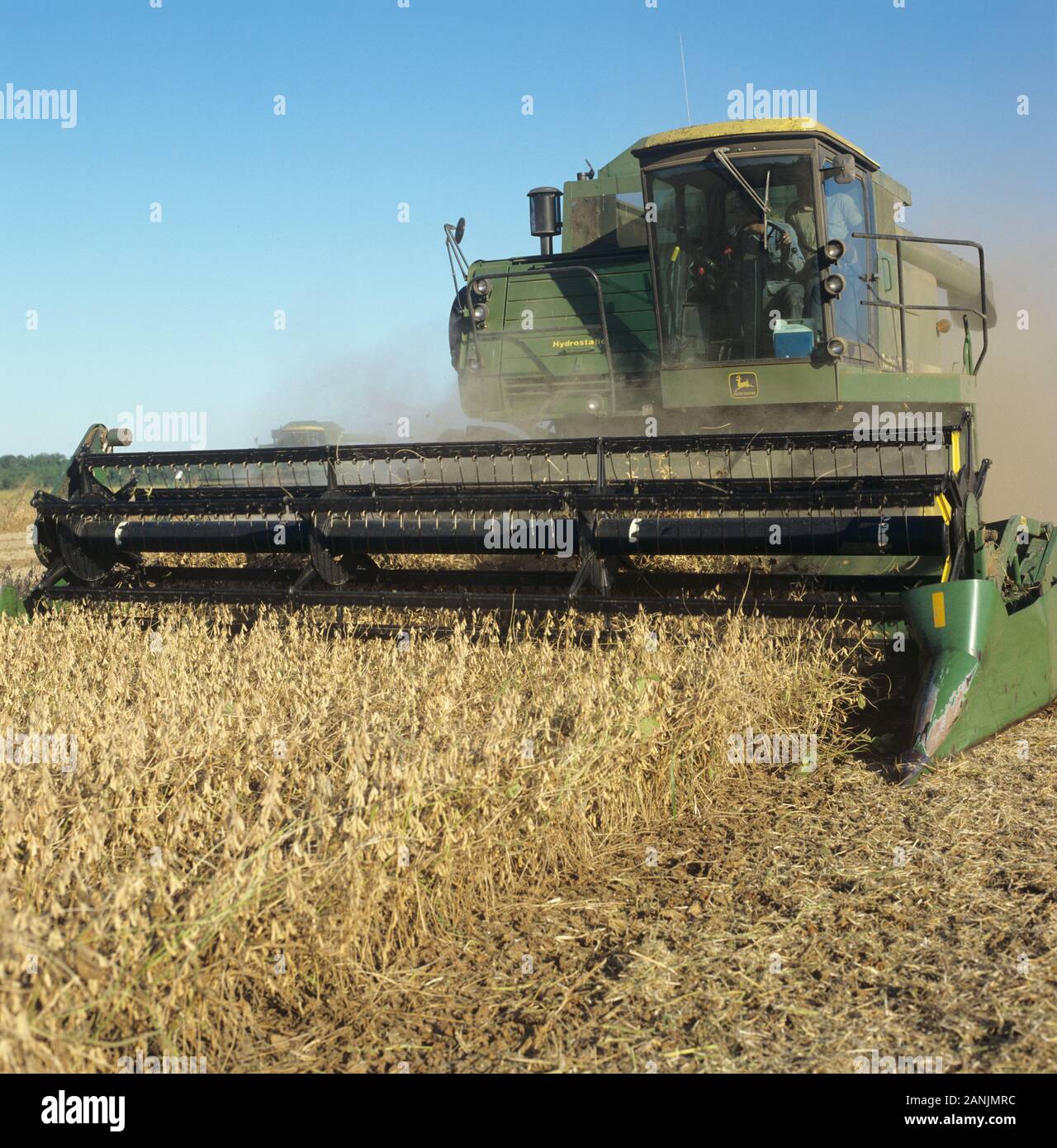 Agriculture john deere combine harvests hi-res stock photography and ...