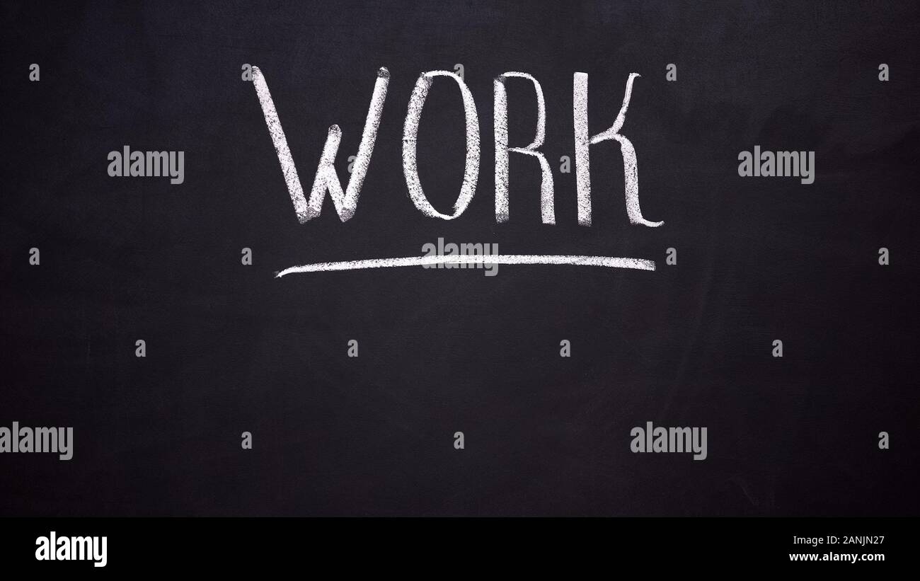 Work word written on chalkboard, planning business activity, time ...