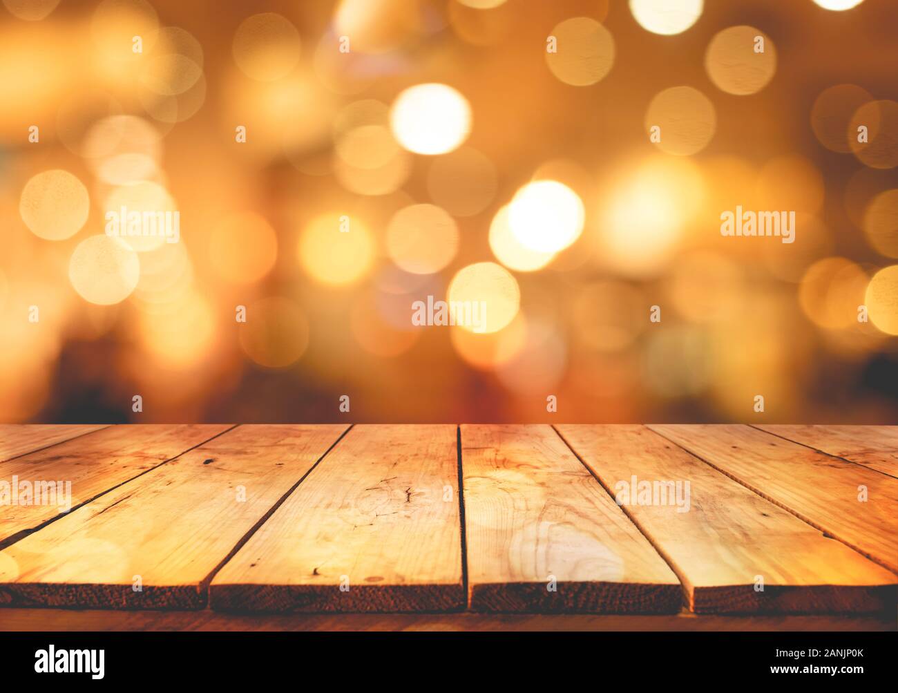 Wood texture table top (counter bar) with blur light gold bokeh in cafe ...