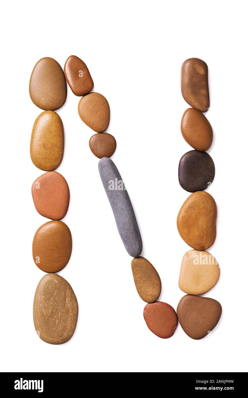 Letter N made of marine small pebbles, top view. Alphabet made of ...