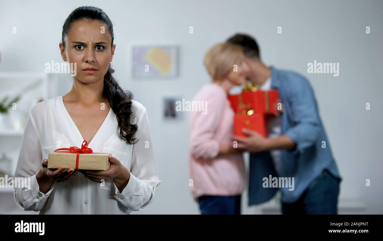 Man giving small presents in hi-res stock photography and images - Alamy