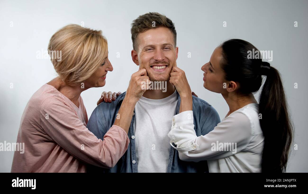 Pinching cheek hi-res stock photography and images - Alamy