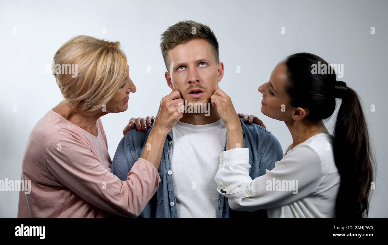 Pinching Cheek High Resolution Stock Photography and Images - Alamy