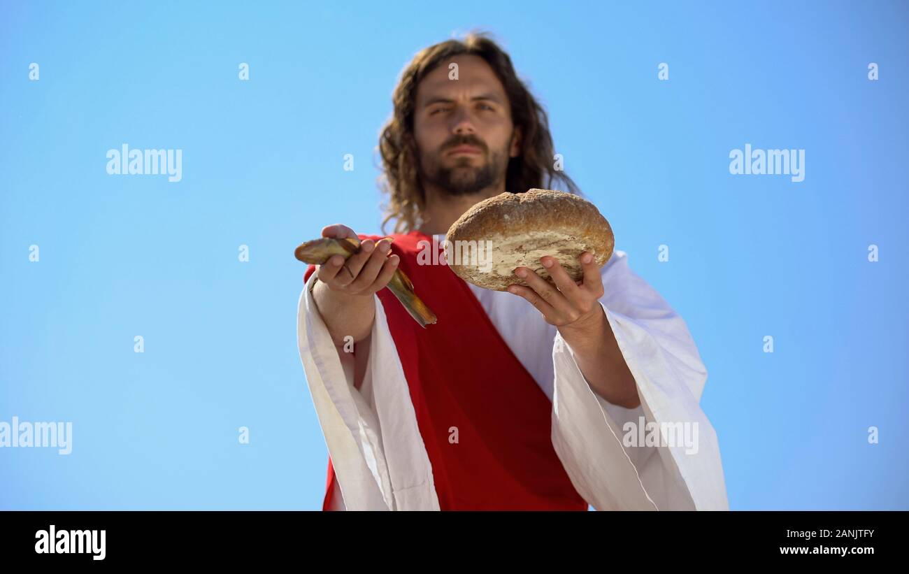 Jesus showing fish and bread, biblical story, miracle about feeding ...